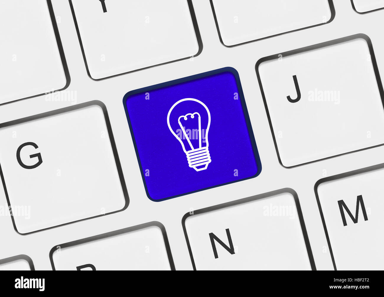 Computer keyboard with lamp key Stock Photo - Alamy