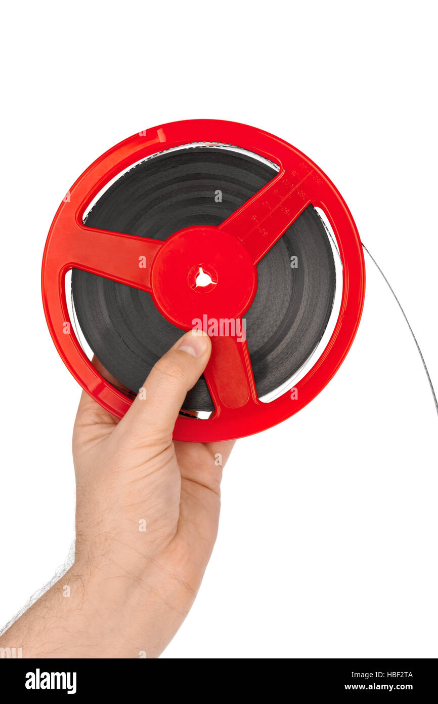 Cinema film reel in hand Stock Photo - Alamy