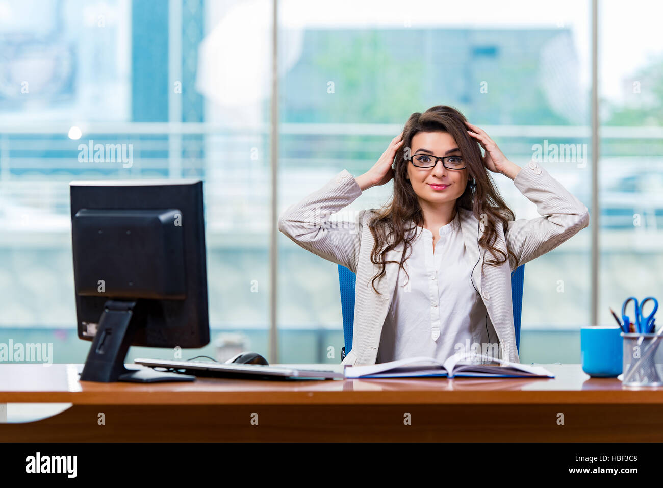 Call center operator working in the office Stock Photo - Alamy