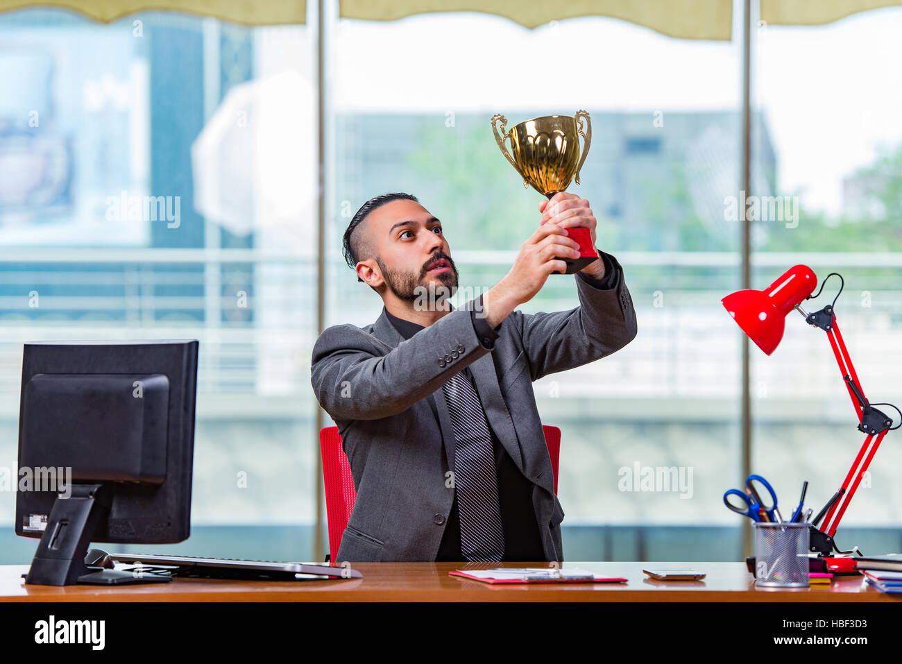 Hands gold trophy winning hi-res stock photography and images - Alamy