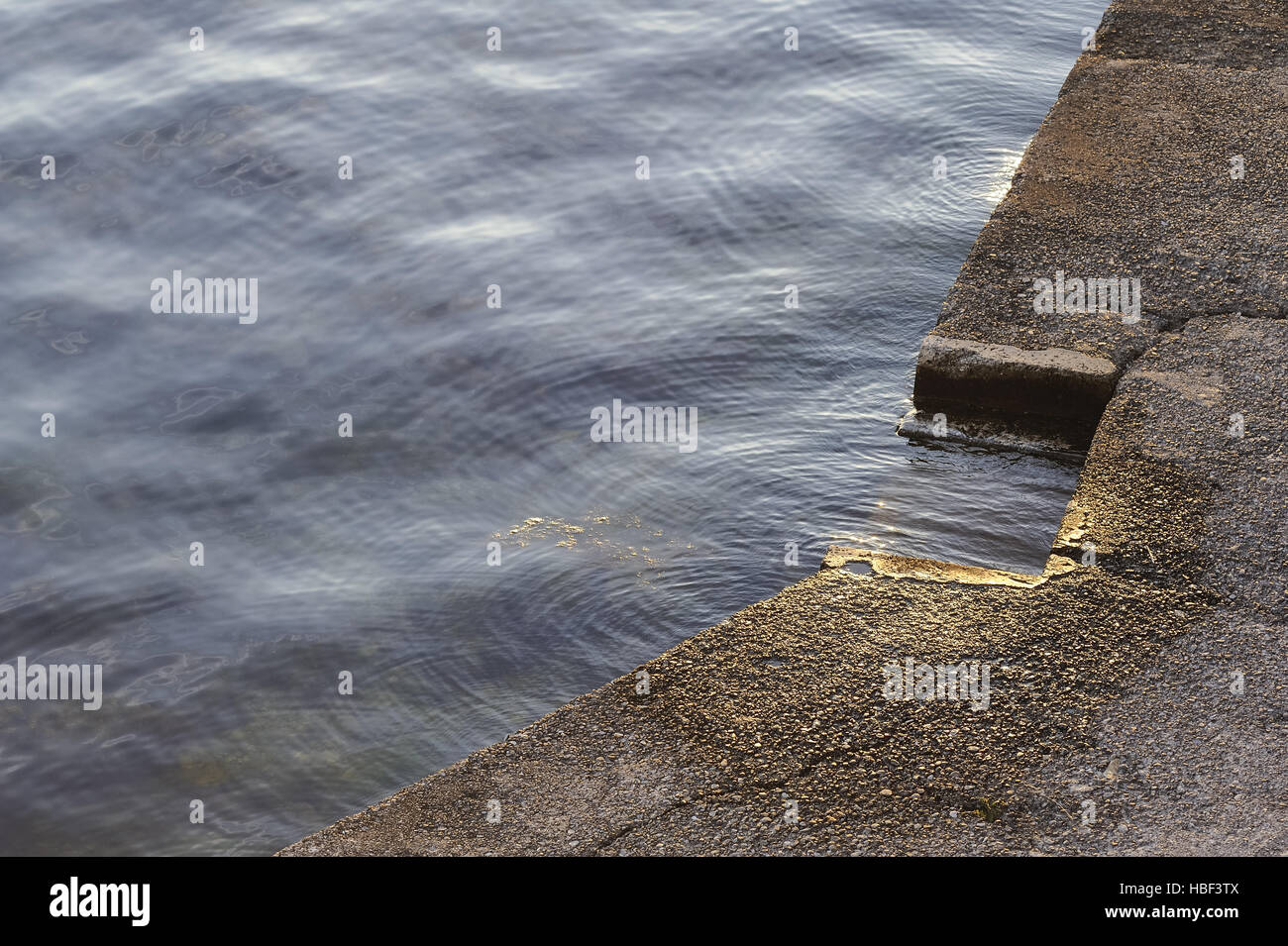 Stairs into the water at the pier Stock Photo - Alamy