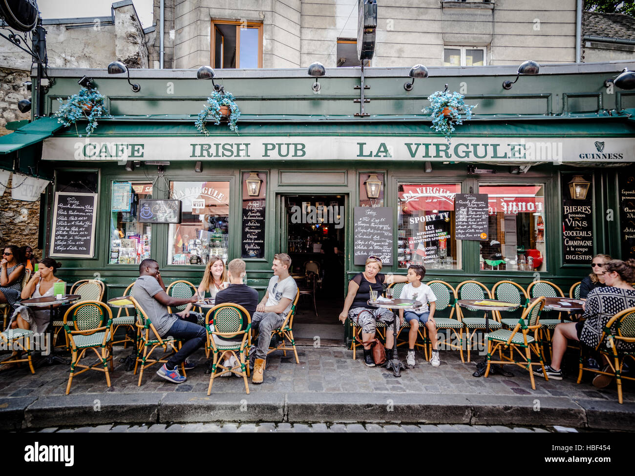 Seated outside paris cafe hi-res stock photography and images - Alamy