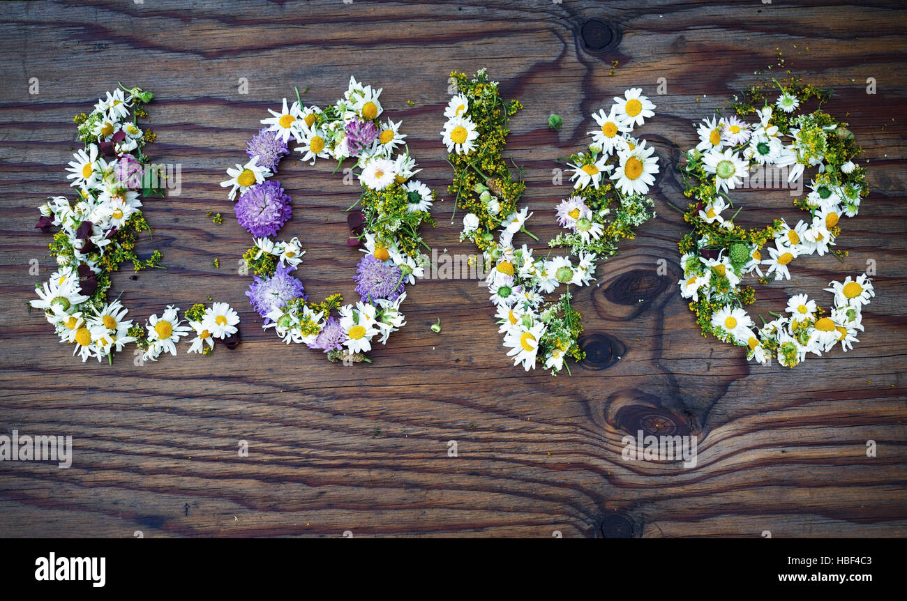 Word love made flowers hi-res stock photography and images - Alamy