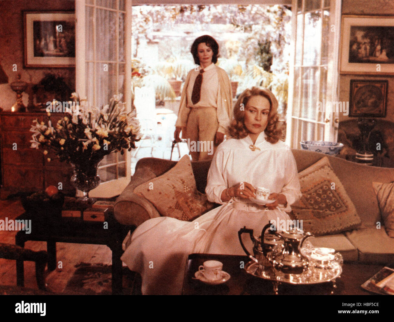 ORDEAL BY INNOCENCE, Faye Dunaway (seated), Sarah Miles, 1985, © Cannon ...
