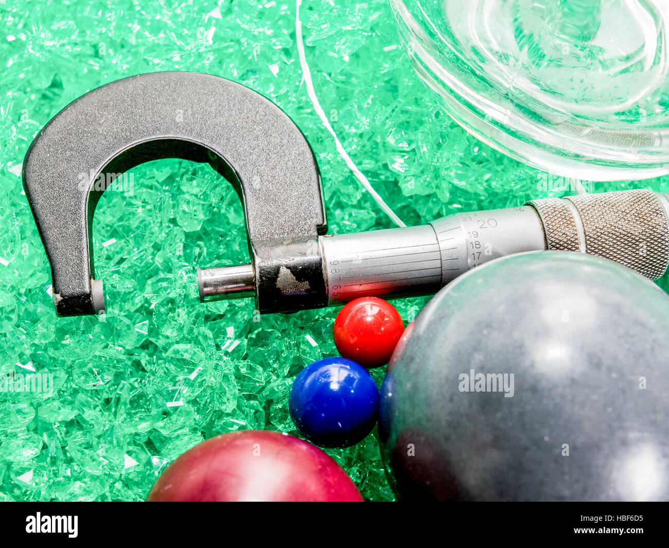 Micrometer with Beads and Balls. Plastic colorful beads and a ...
