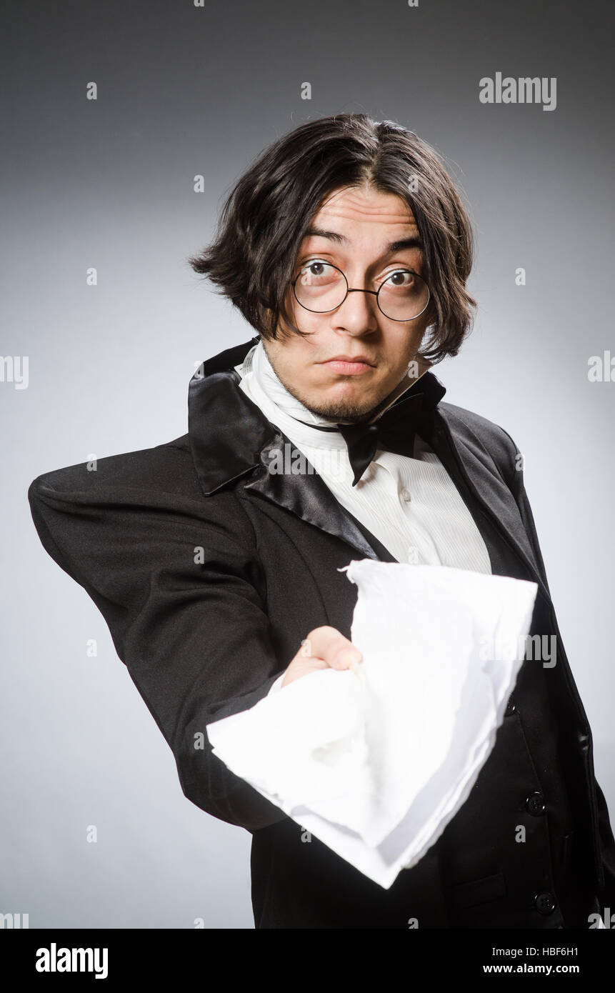 Funny writer with quill in vintage concept Stock Photo - Alamy