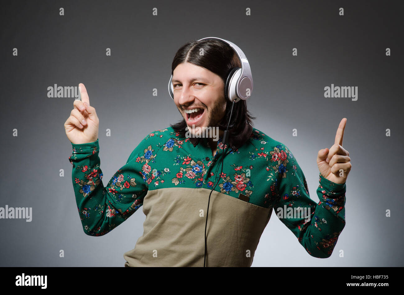 Young man with headphones in DJ concept Stock Photo - Alamy