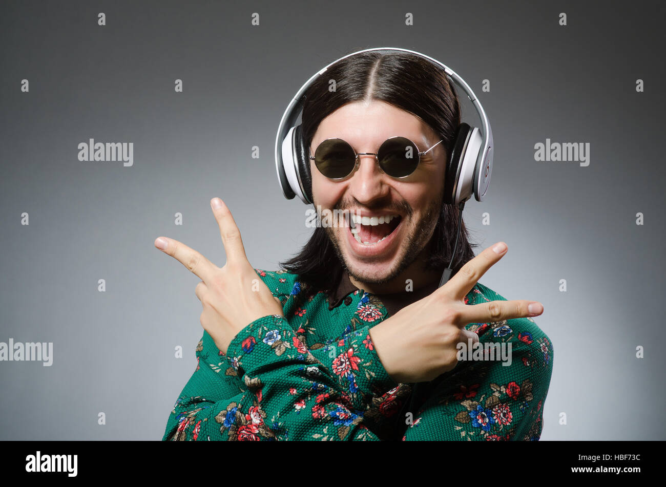 Young man with headphones in DJ concept Stock Photo - Alamy