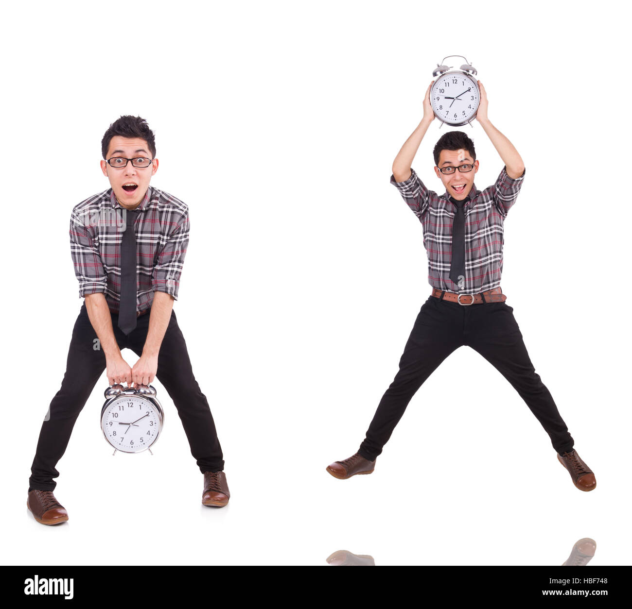 Young man with clock isolated on white Stock Photo - Alamy