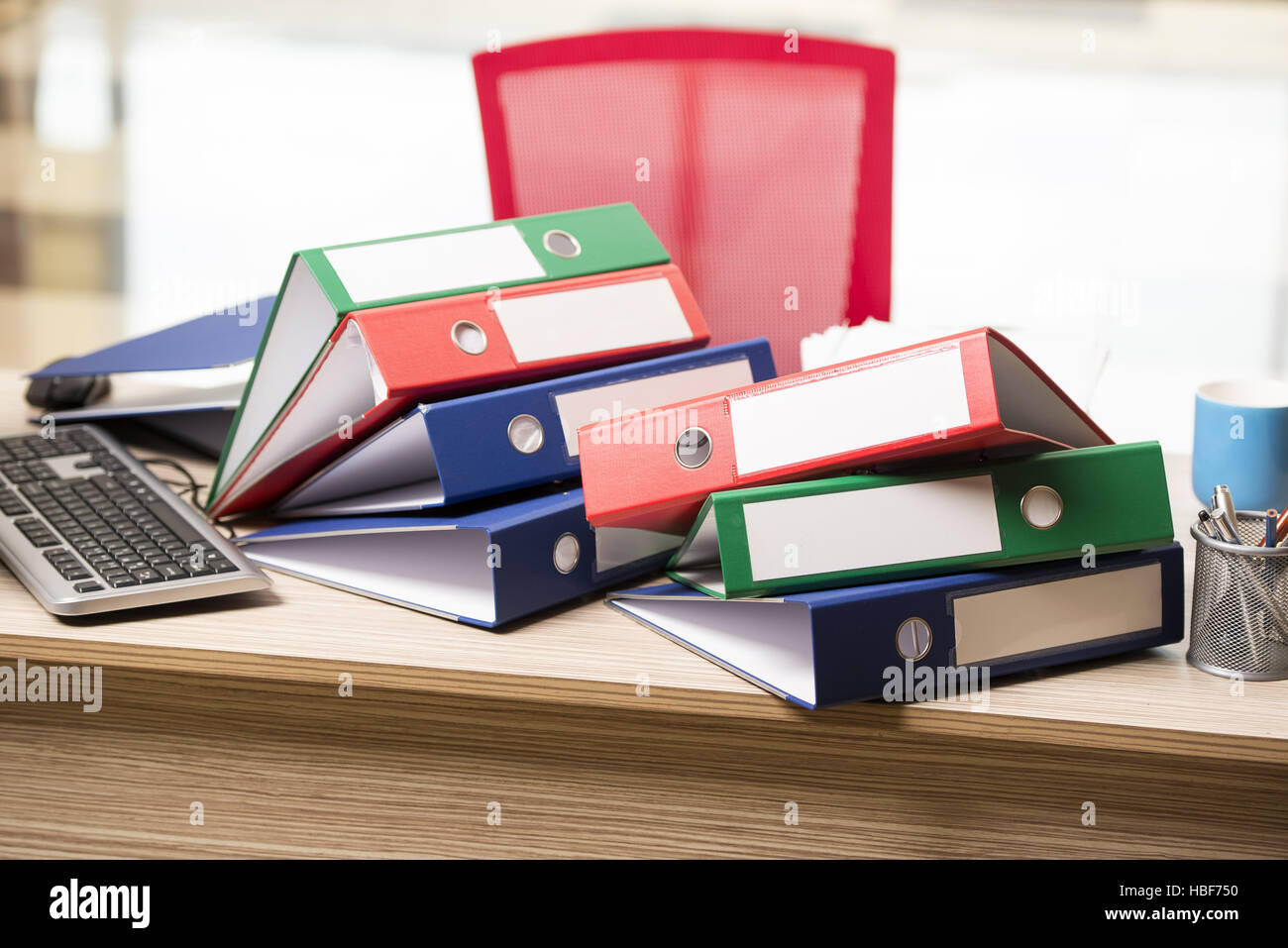Stacks of office binders on desk Stock Photo - Alamy