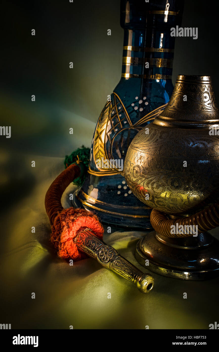 Still Life with Water Pipe. Nargile-Hookah with engraved equipment on ...