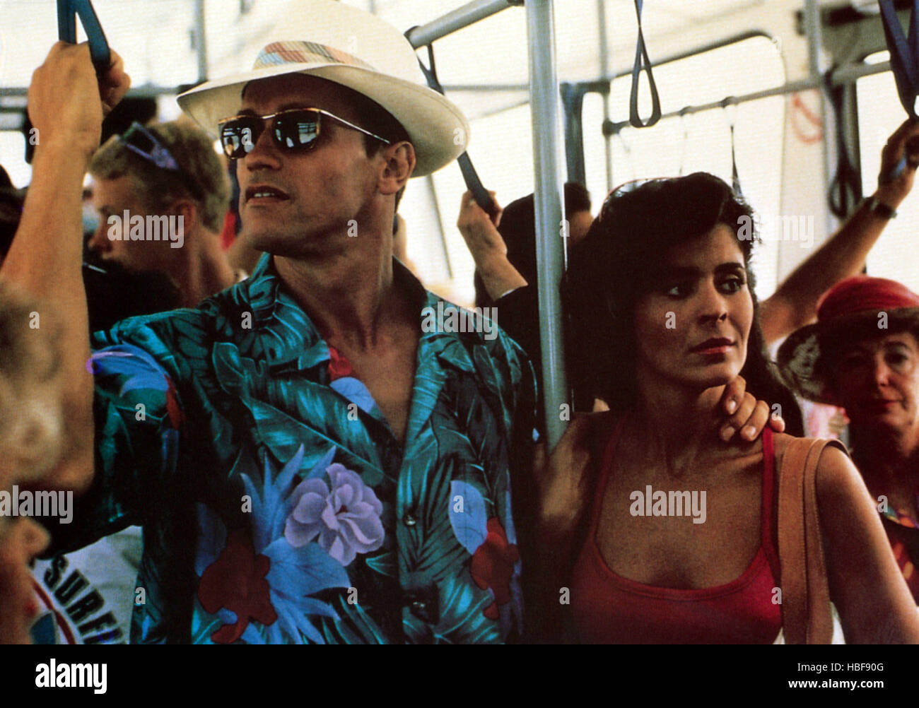 THE RUNNING MAN, from left: Arnold Schwarzenegger, Maria Conchita ...