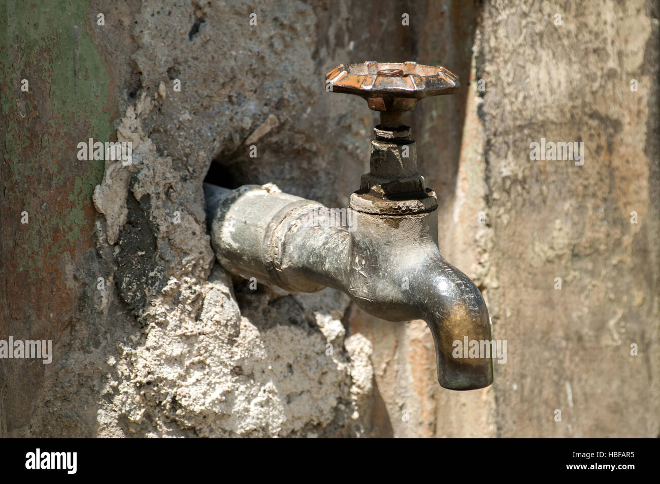 Weathered tap water crane Stock Photo - Alamy