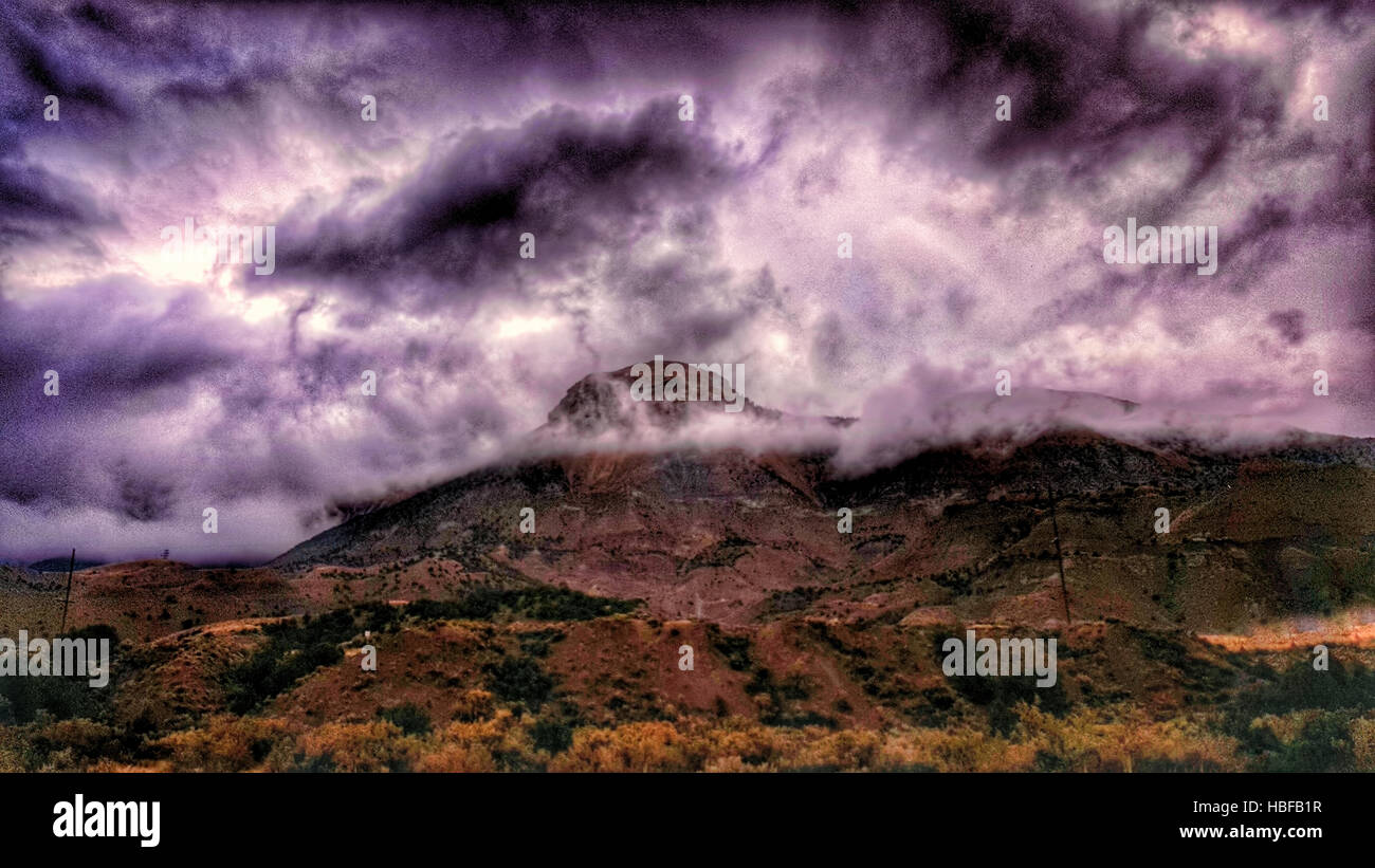 Beautiful storm clouds surround a Colorado peak Stock Photo - Alamy