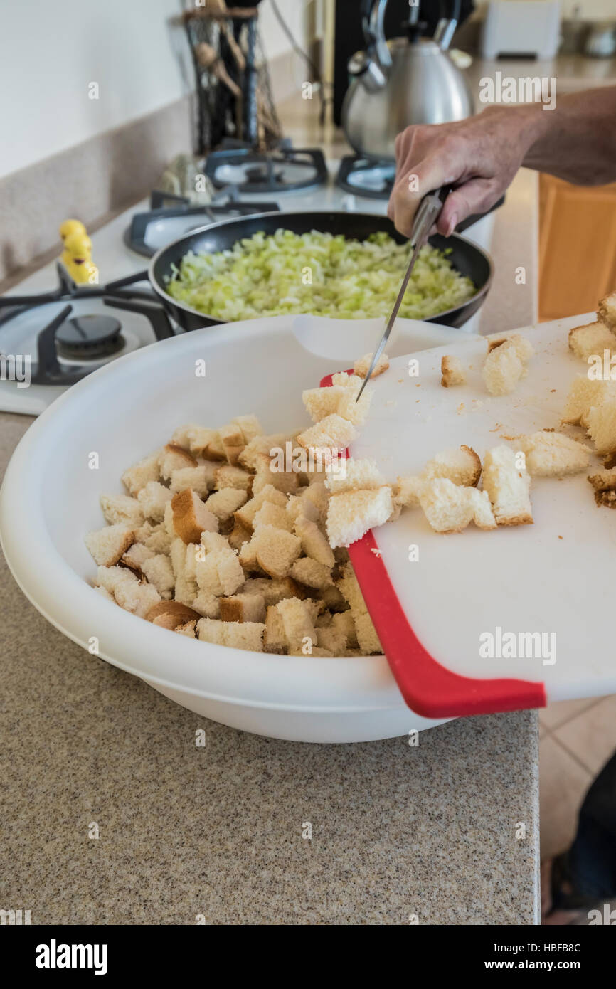 woman making turkey stuffing for thanksgiving Stock Photo - Alamy