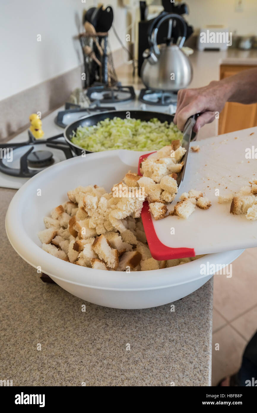 woman making turkey stuffing for thanksgiving Stock Photo - Alamy