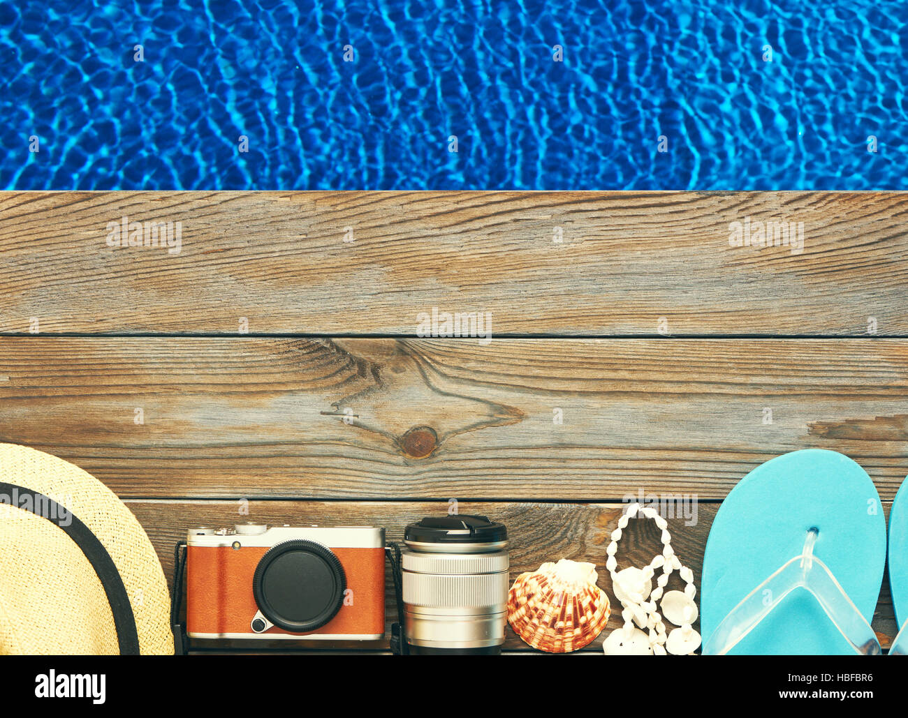 Beach items at pool Stock Photo - Alamy