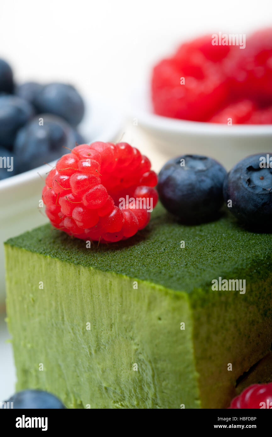 green tea matcha mousse cake with berries Stock Photo - Alamy
