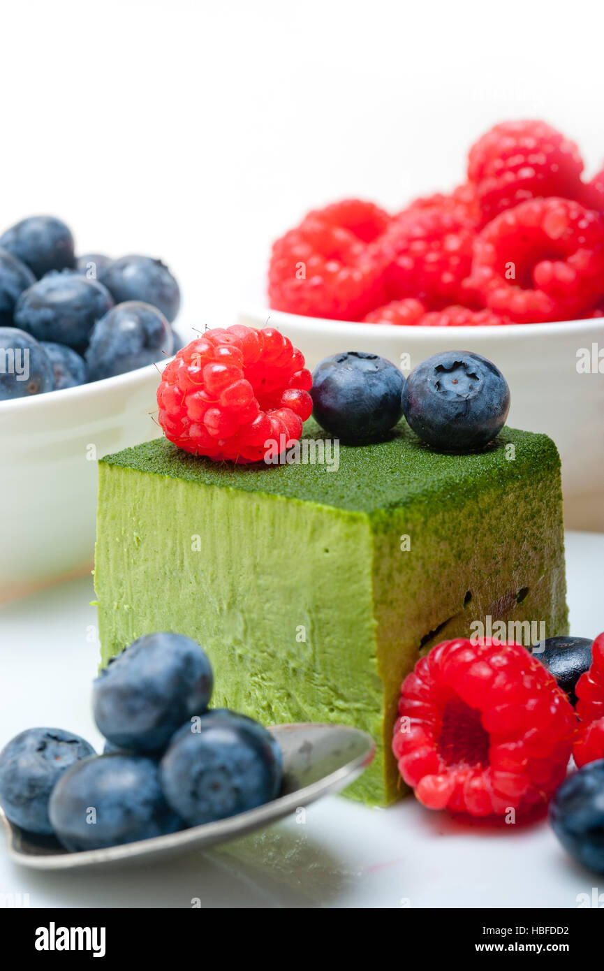green tea matcha mousse cake with berries Stock Photo - Alamy