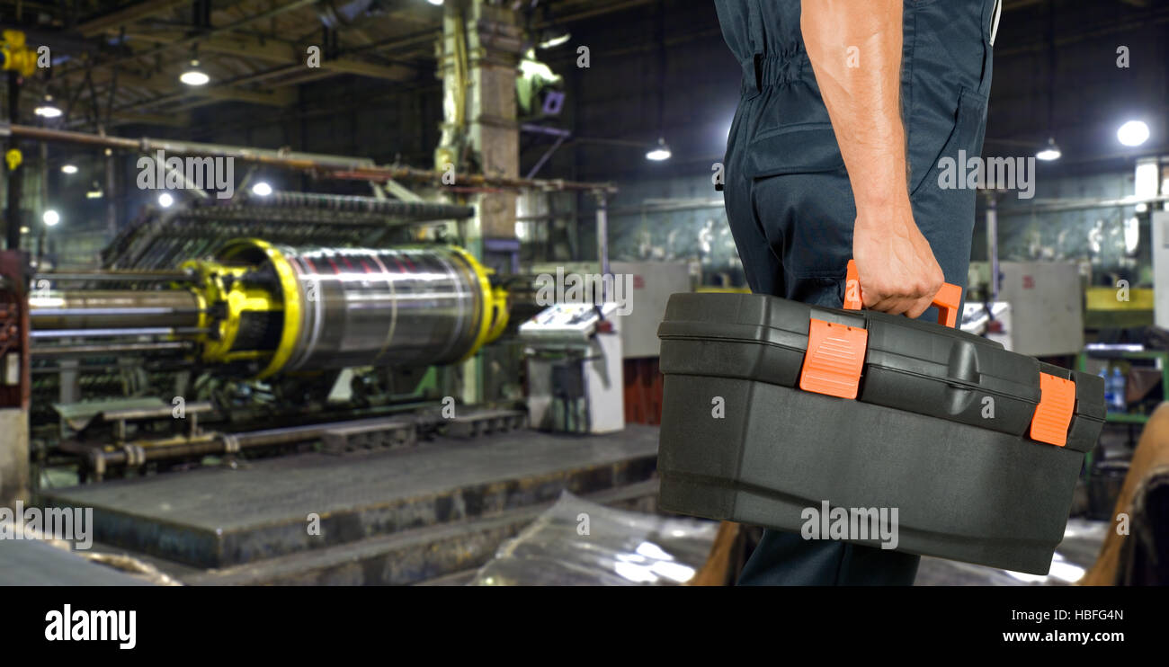 Worker with instruments Stock Photo - Alamy