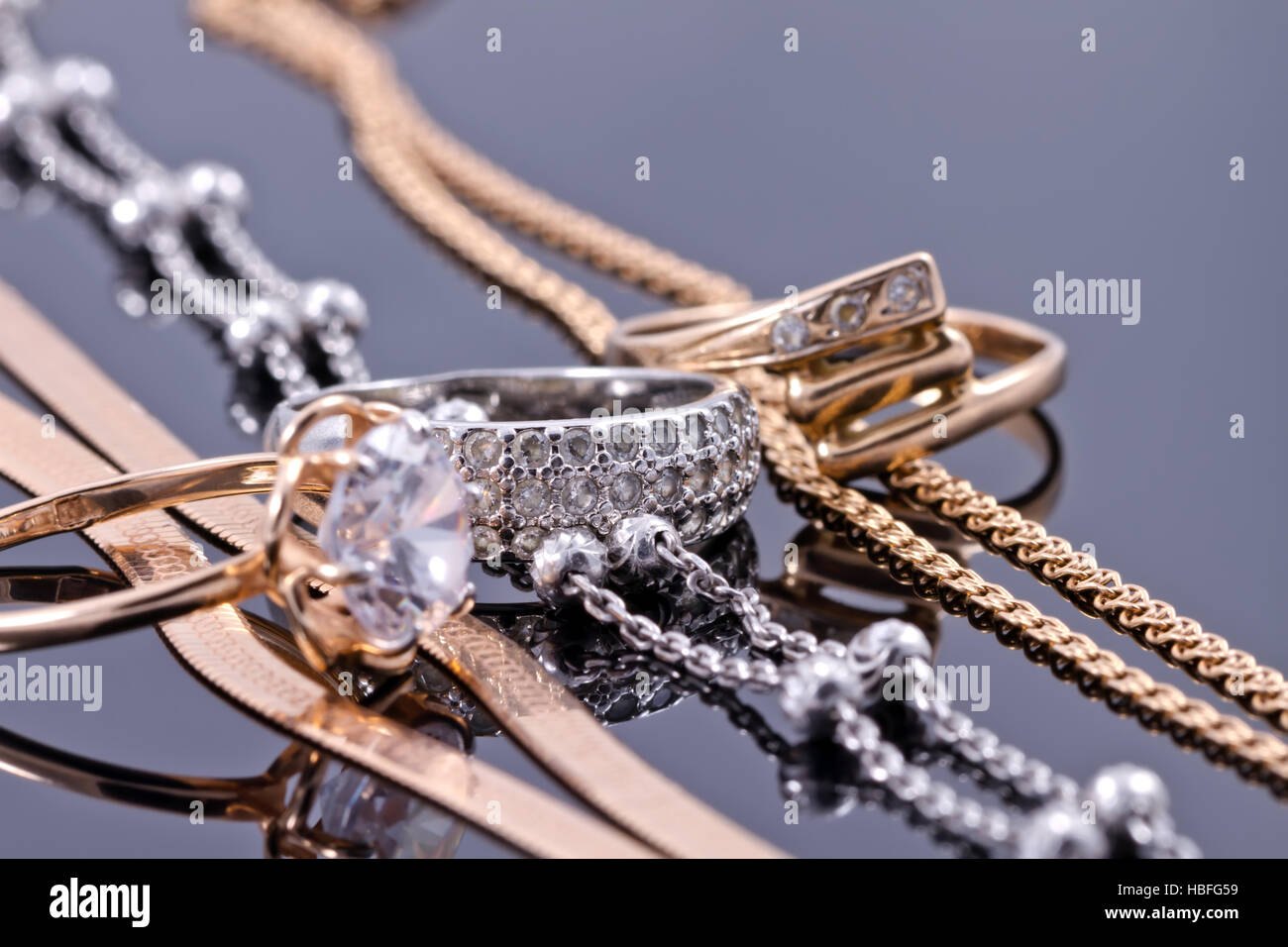 Golden chains necklace hi-res stock photography and images - Alamy