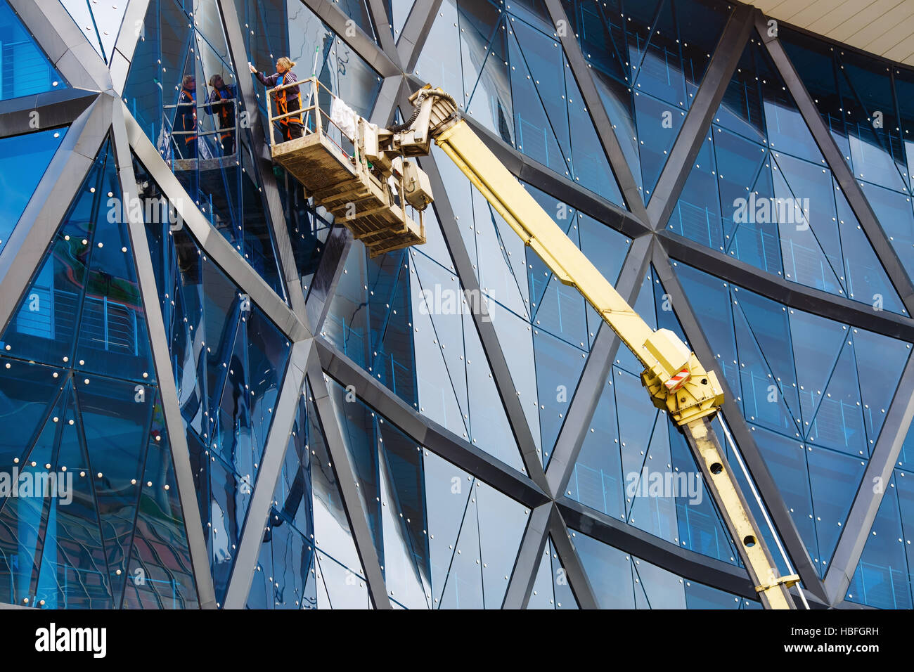 Woman washes windows Stock Photo - Alamy
