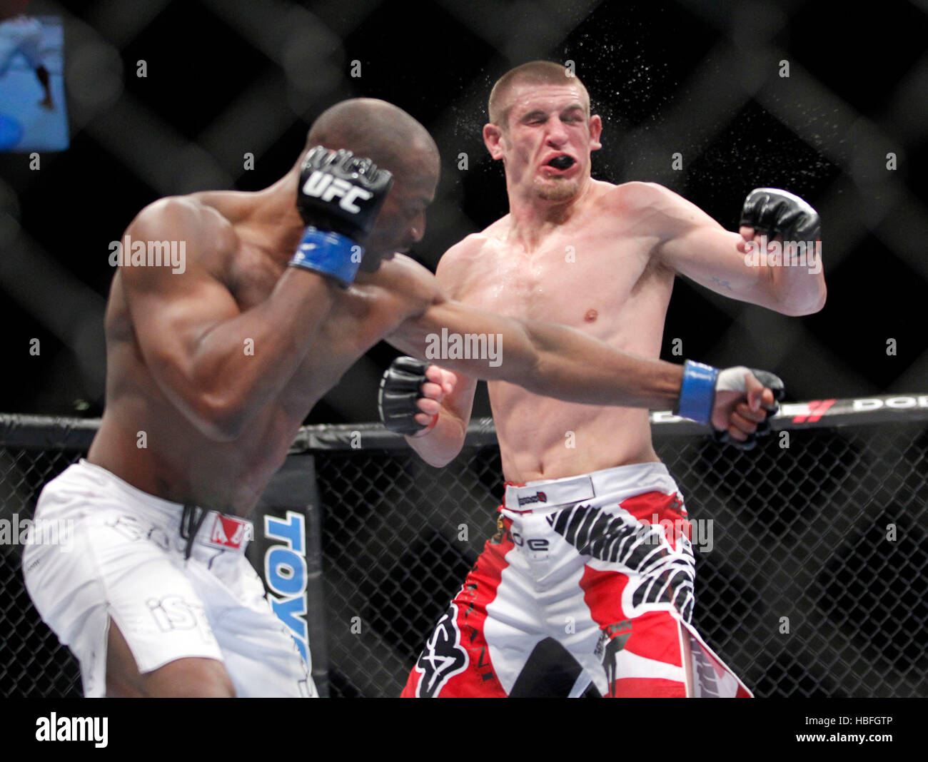 Clifford Starks, left, punches Dustin Jacoby during UFC 137 at the ...
