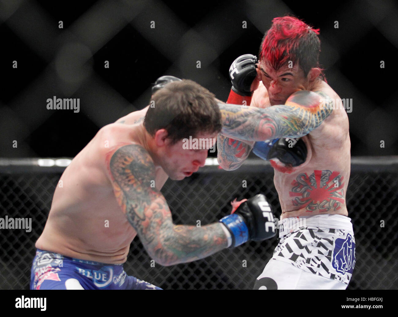 Scott Jorgensen, right, fights Jeff Curran during UFC 137 at the ...