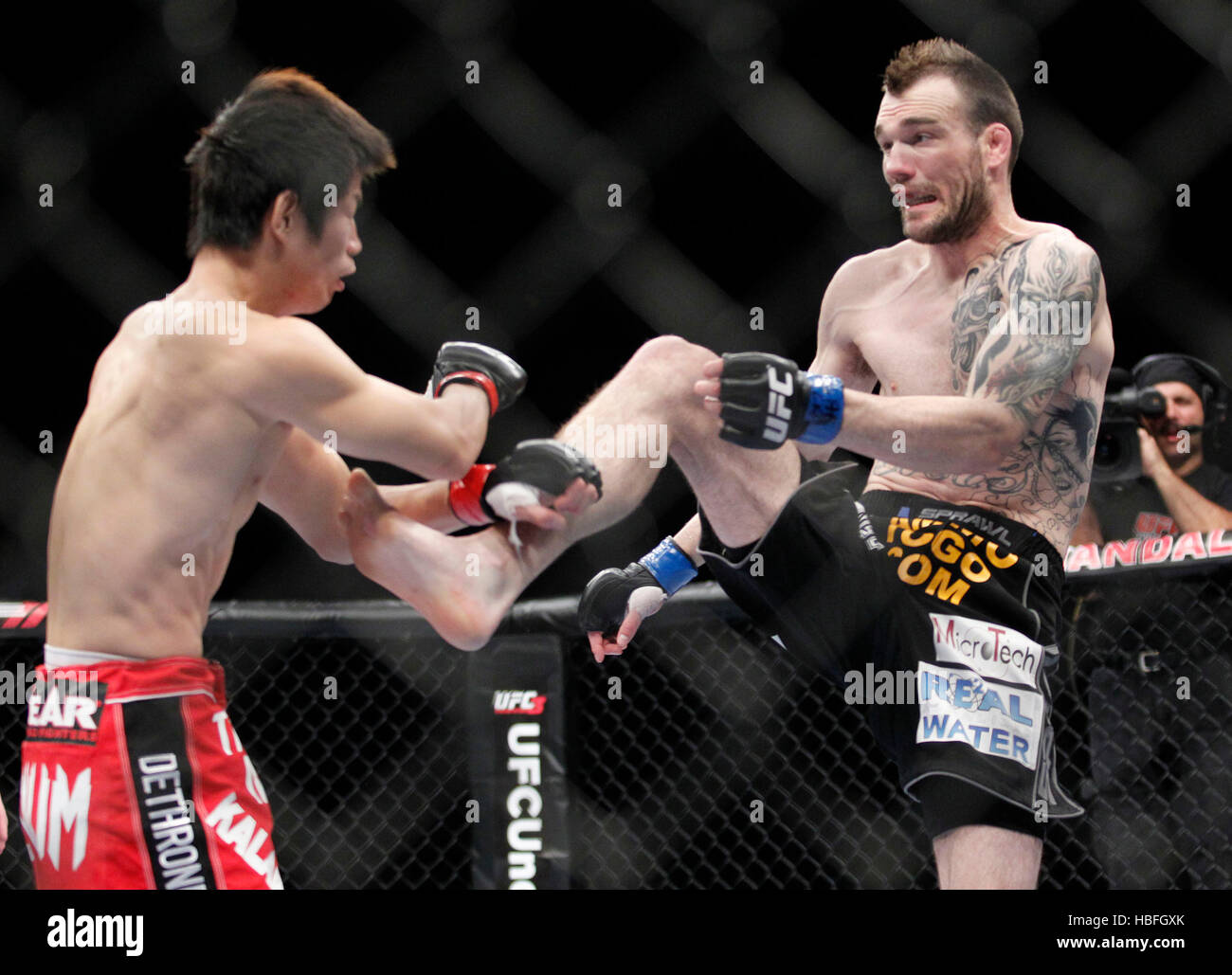 George Roop, right, kicks Hatsu Hioki during UFC 137 at the Mandalay ...