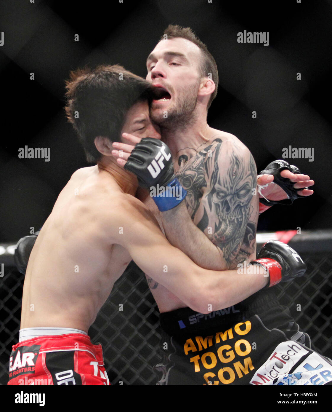 Hatsu Hiok, left, clashes with George Roop during UFC 137 at the ...