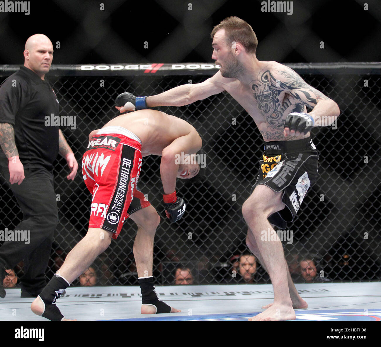 Hatsu Hioki, left, ducks a punch byGeorge Roop during UFC 137 at the ...