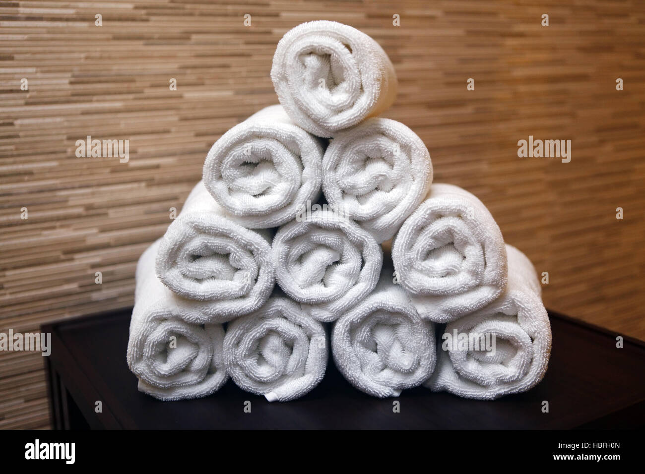 Freshly washed rolled towels Stock Photo - Alamy