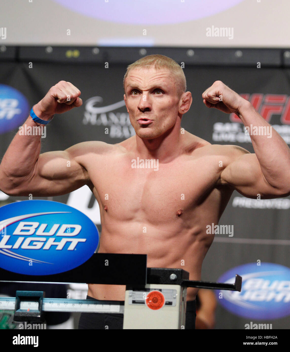 UFC fighter Dennis Silver on the scale during a weigh-in for UFC 137 in ...