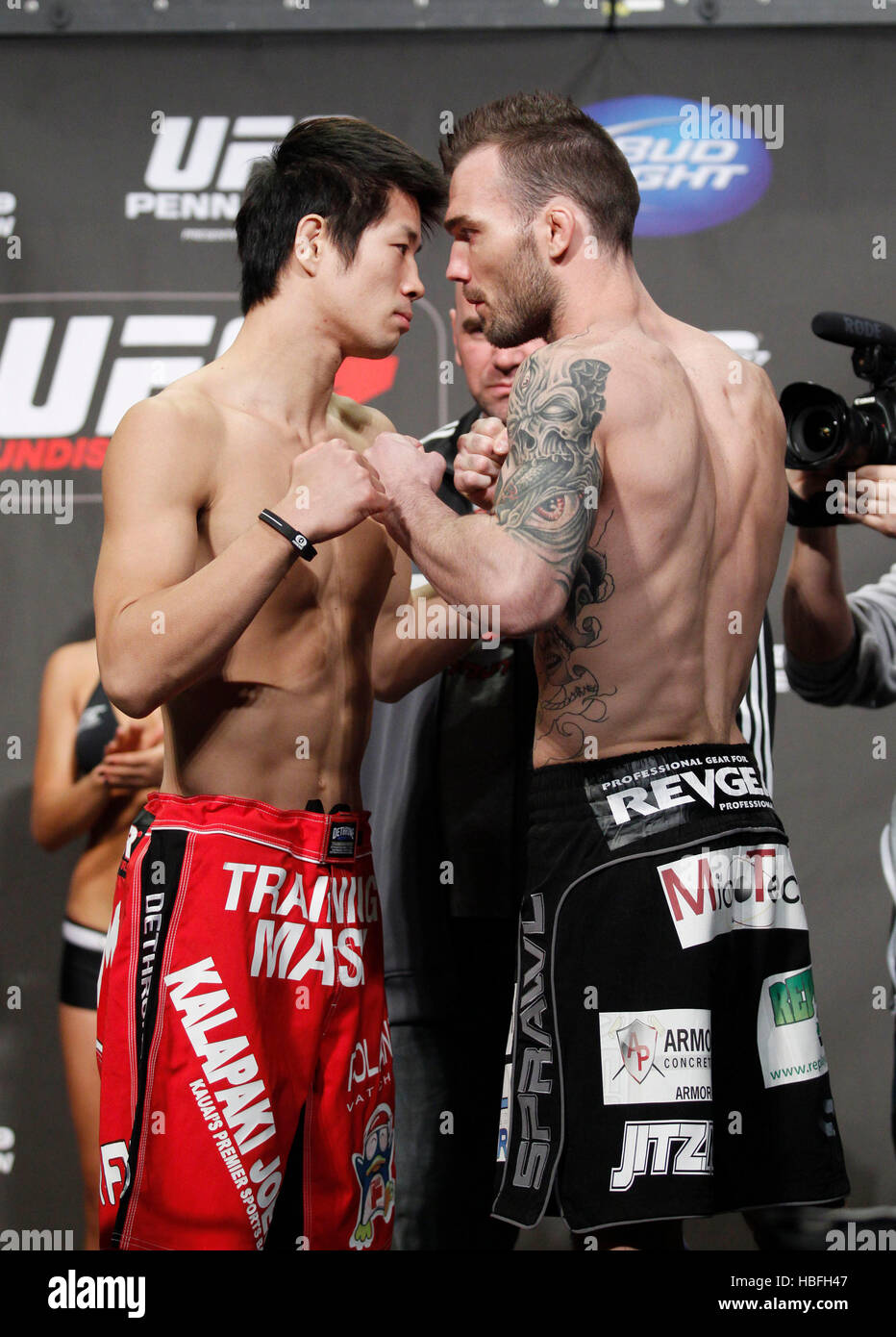 UFC fighters Hatsu Hioki of Japan, left, and George Roop square off ...