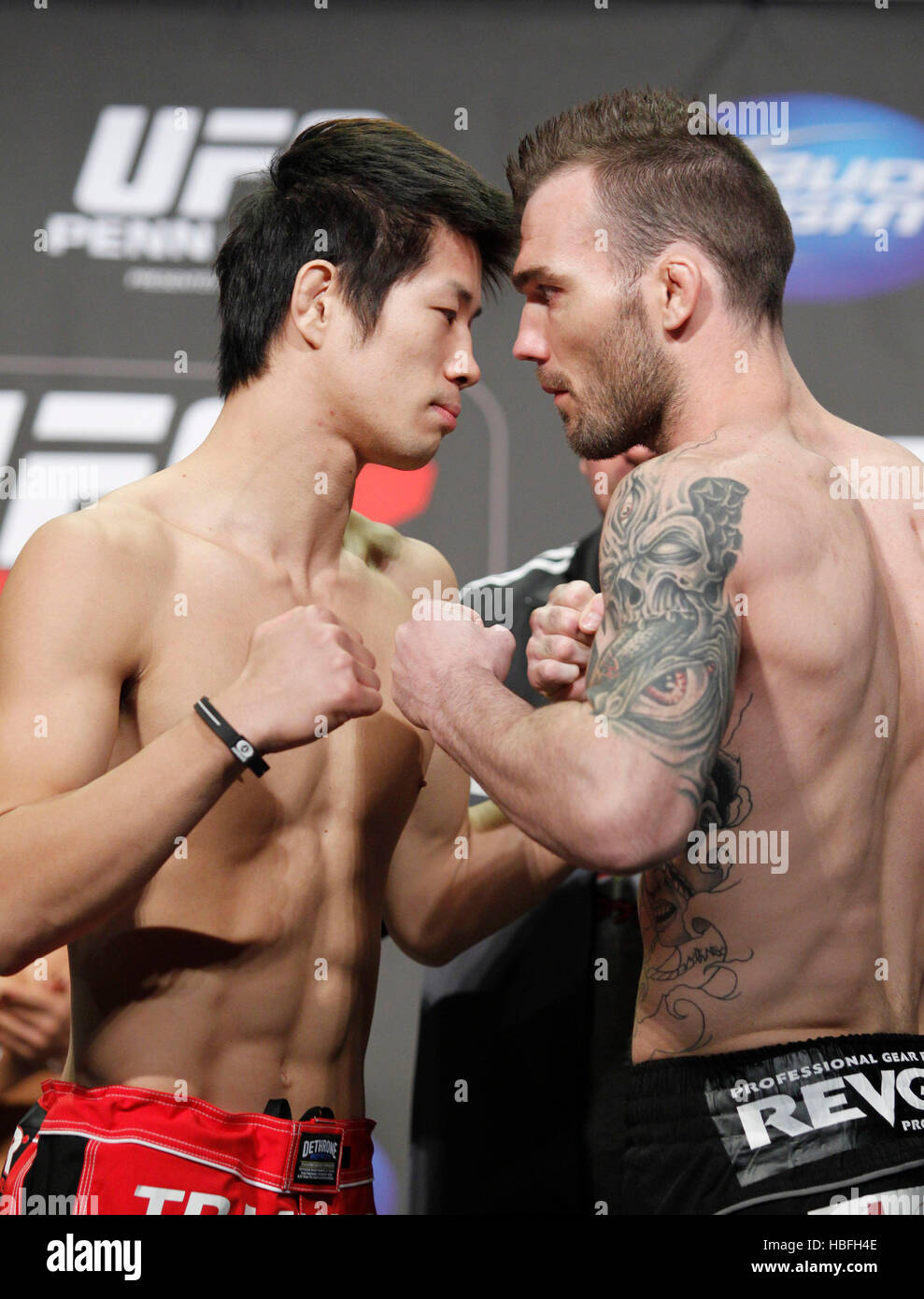 UFC fighters Hatsu Hioki of Japan, left, and George Roop square off ...