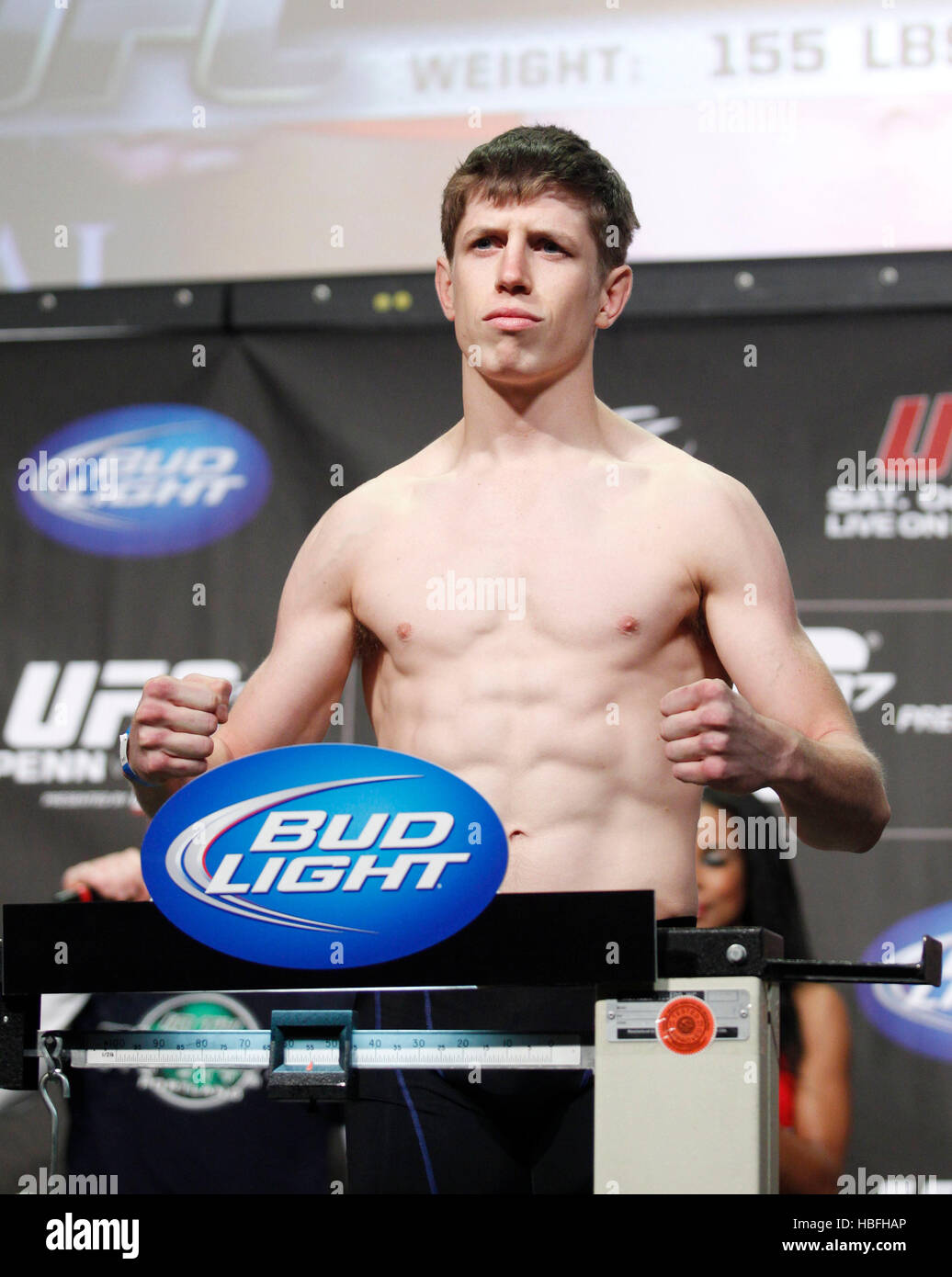 UFC fighter Danny Downes on the scale during a weigh-in for UFC 137 in ...