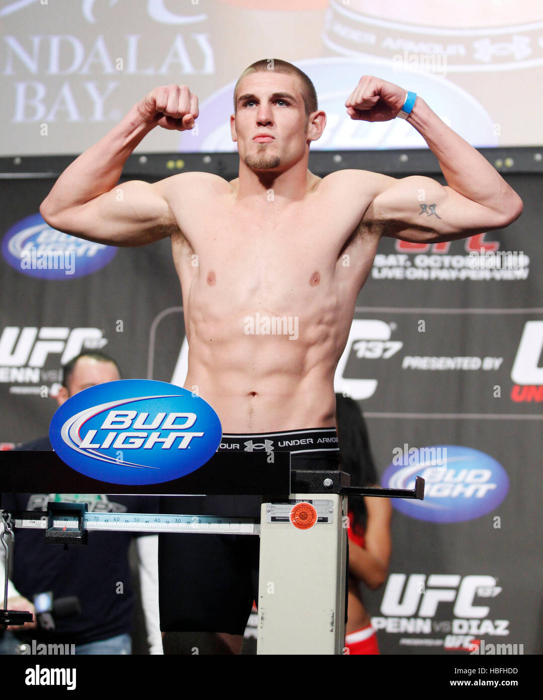 UFC fighter Dustin Jacoby on the scale during a weigh-in for UFC 137 in ...