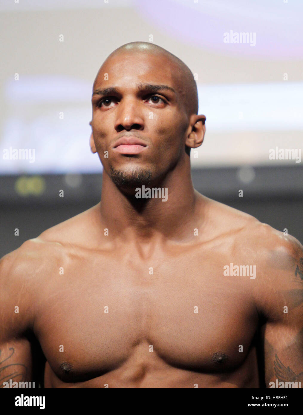 UFC fighter Francis Carmont on the scale during a weigh-in for UFC 137 ...