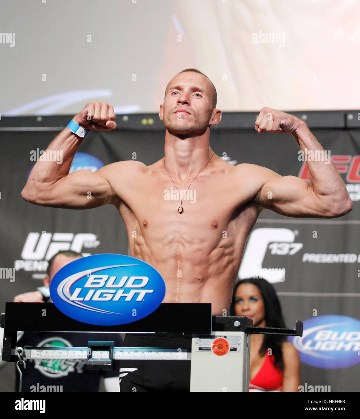 UFC fighter Donald Cerrone on the scale during a weigh-in for UFC 137 ...