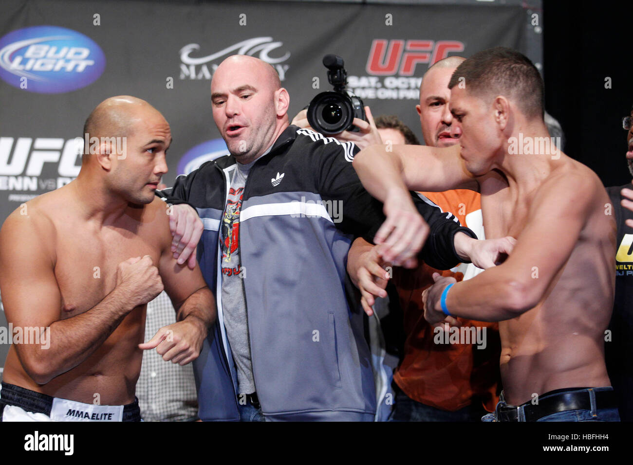 UFC fighters Nick Diaz, right, and BJ Penn, left, is separated by UFC ...