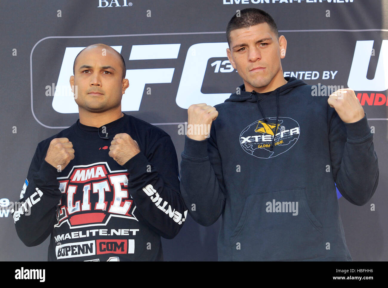 UFC fighters BJ Penn, left, and Nick Diaz pose for photos during a ...