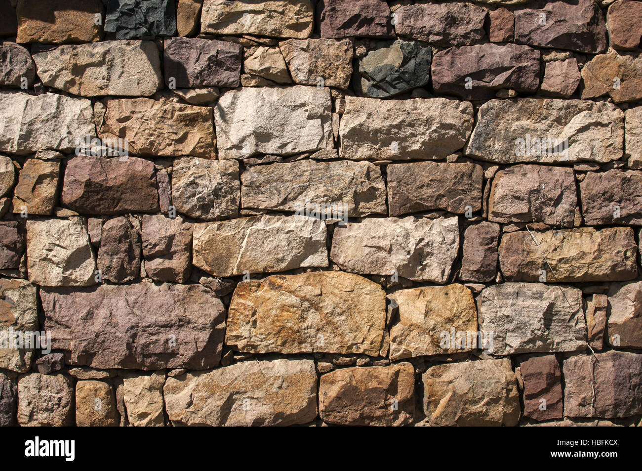 Masonry house stone wall Stock Photo - Alamy
