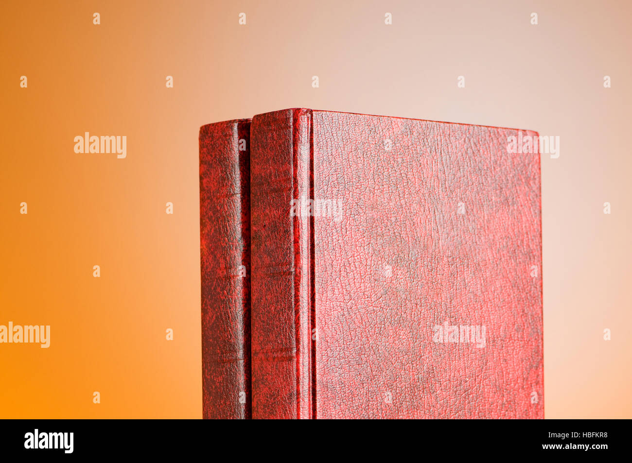 Education concept with red cover books Stock Photo - Alamy