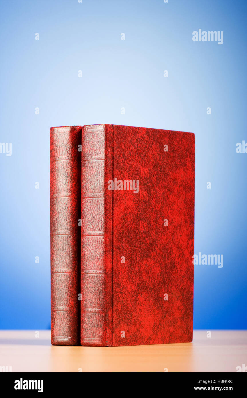 Education concept with red cover books Stock Photo - Alamy