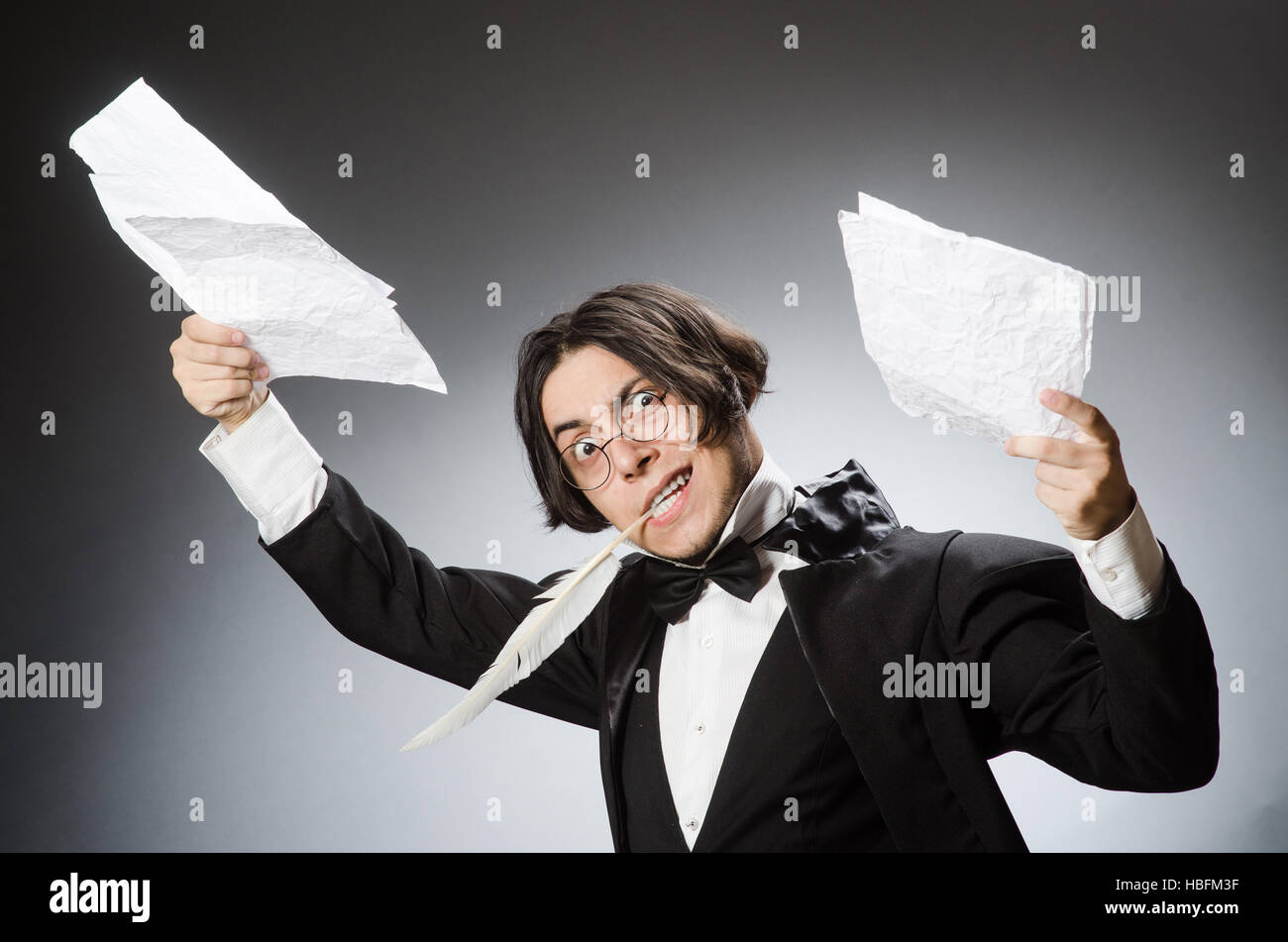 Funny writer with quill in vintage concept Stock Photo - Alamy