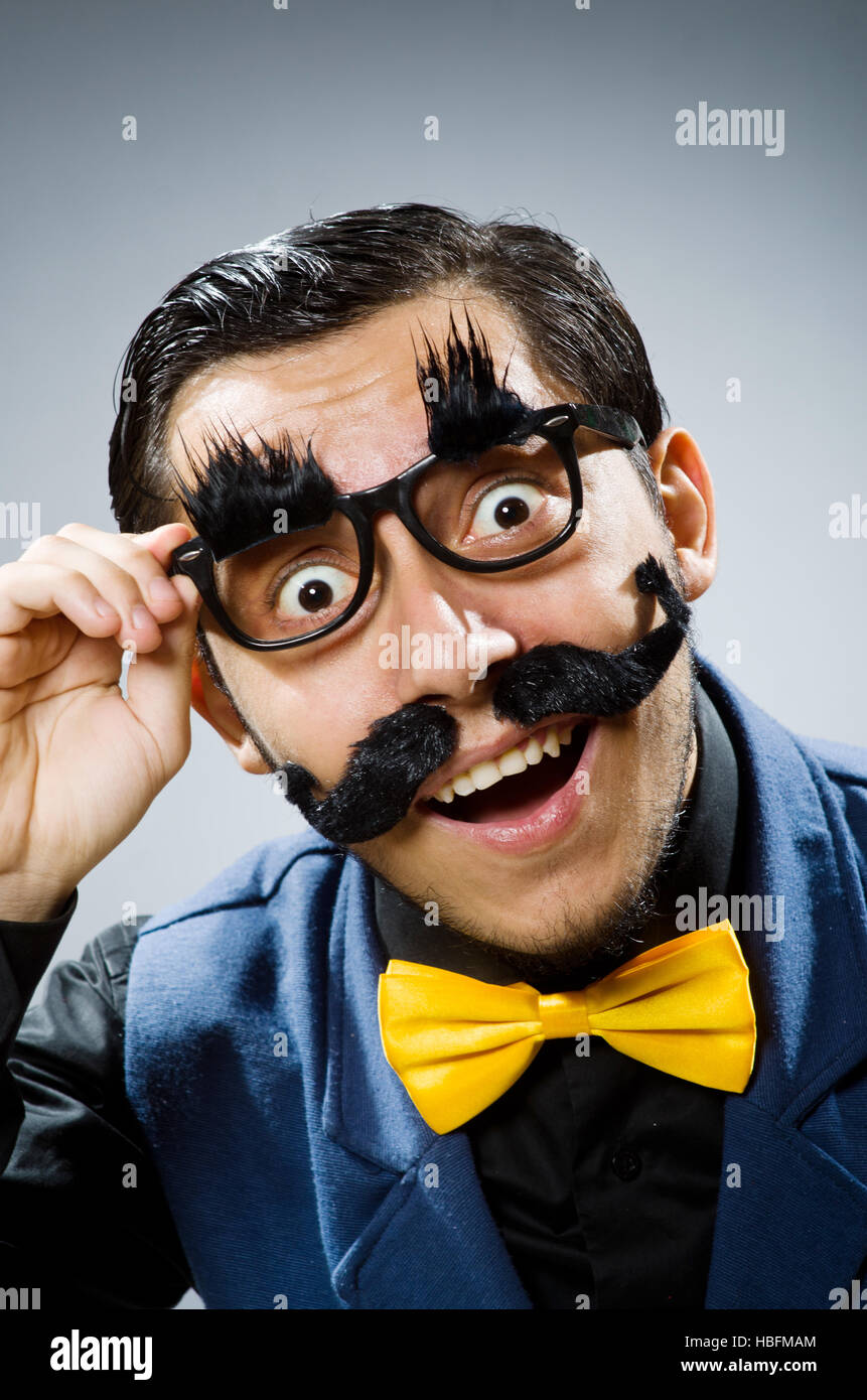 Funny man against dark background Stock Photo - Alamy