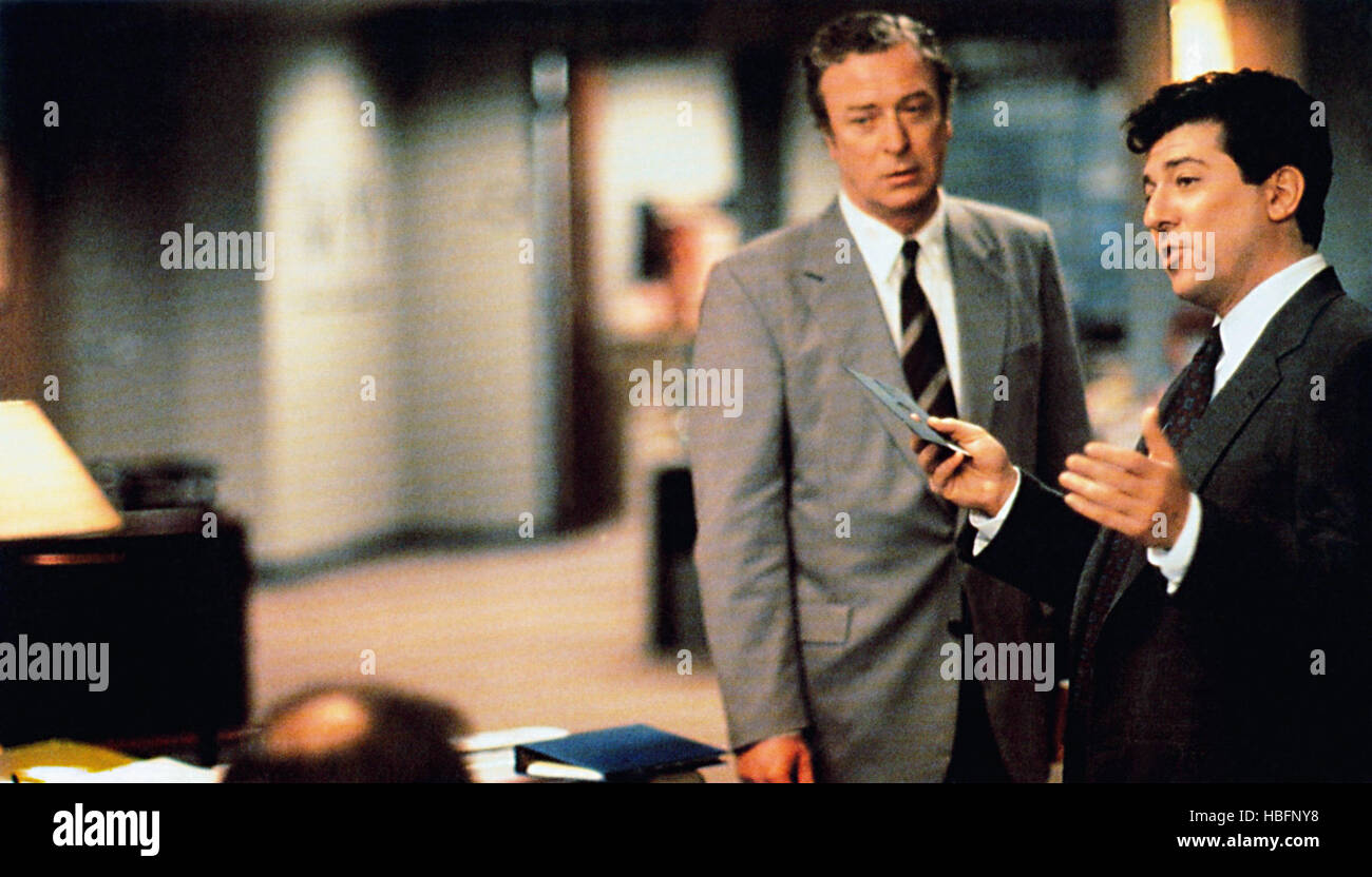 A SHOCK TO THE SYSTEM, from left: Michael Caine, Peter Riegert, 1990 ...