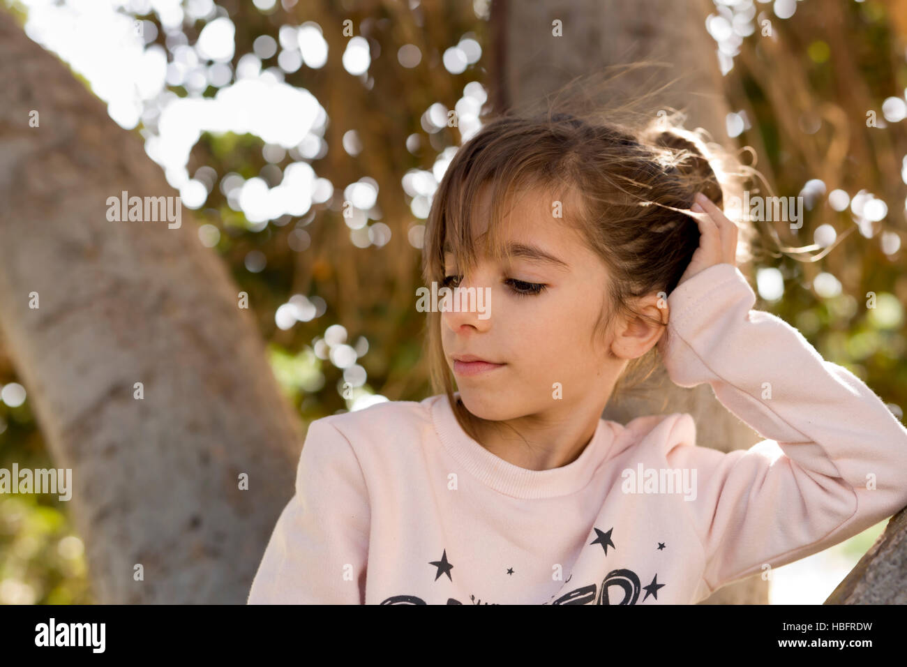 Girl up tree hi-res stock photography and images - Alamy