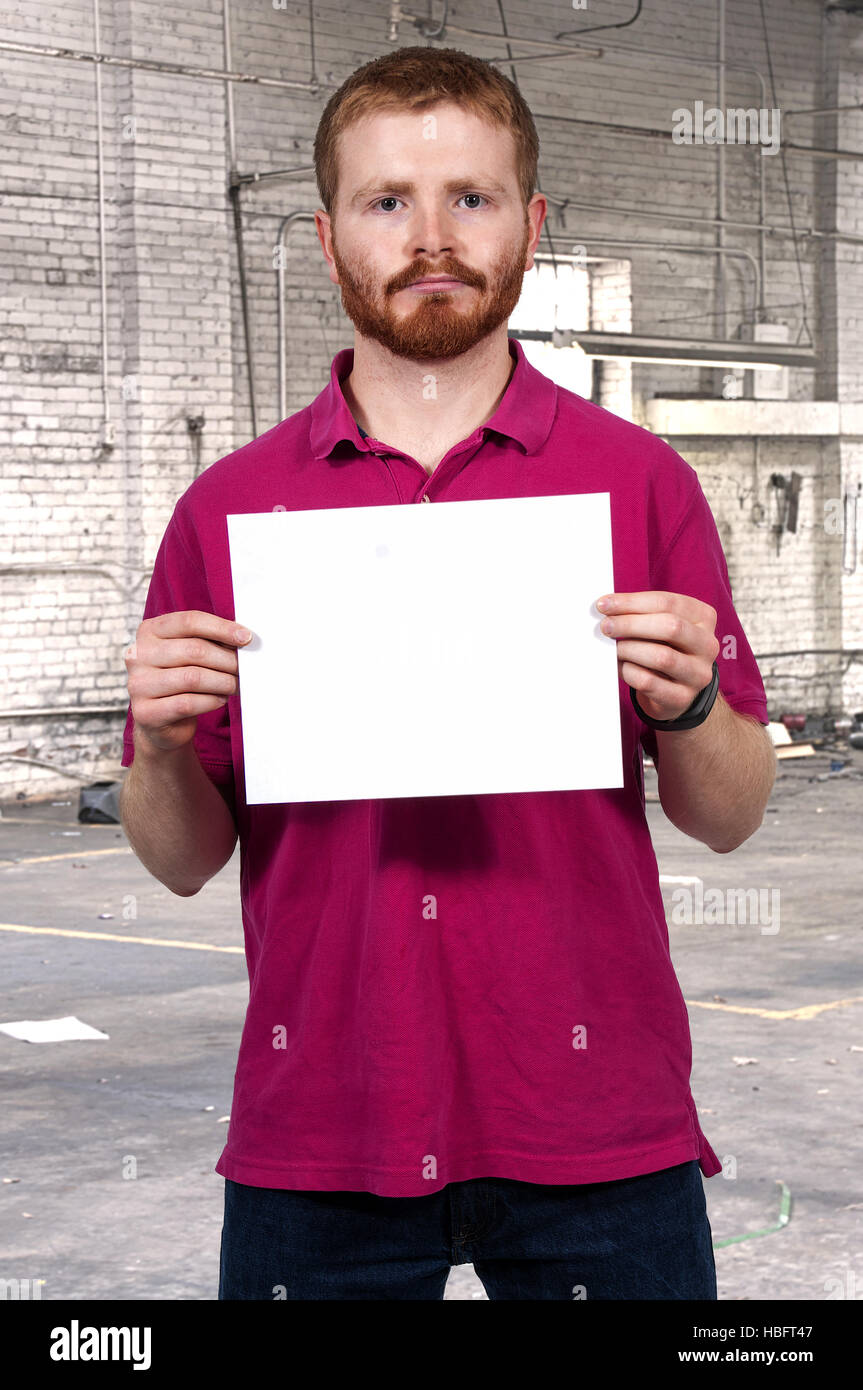 Man holding piece of paper hi-res stock photography and images - Alamy