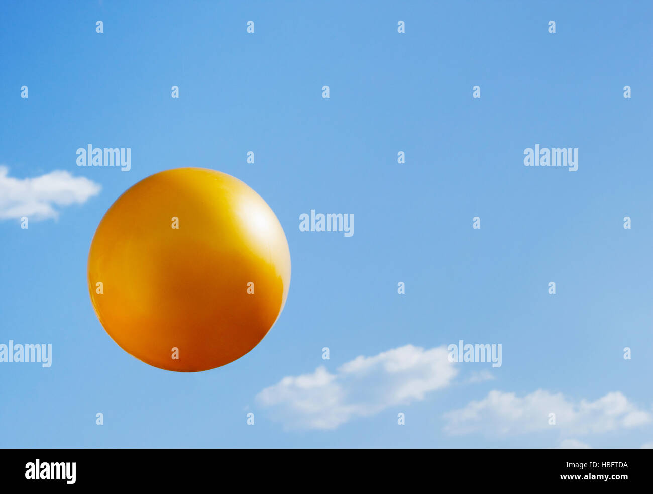 Ball of golden colour Stock Photo - Alamy
